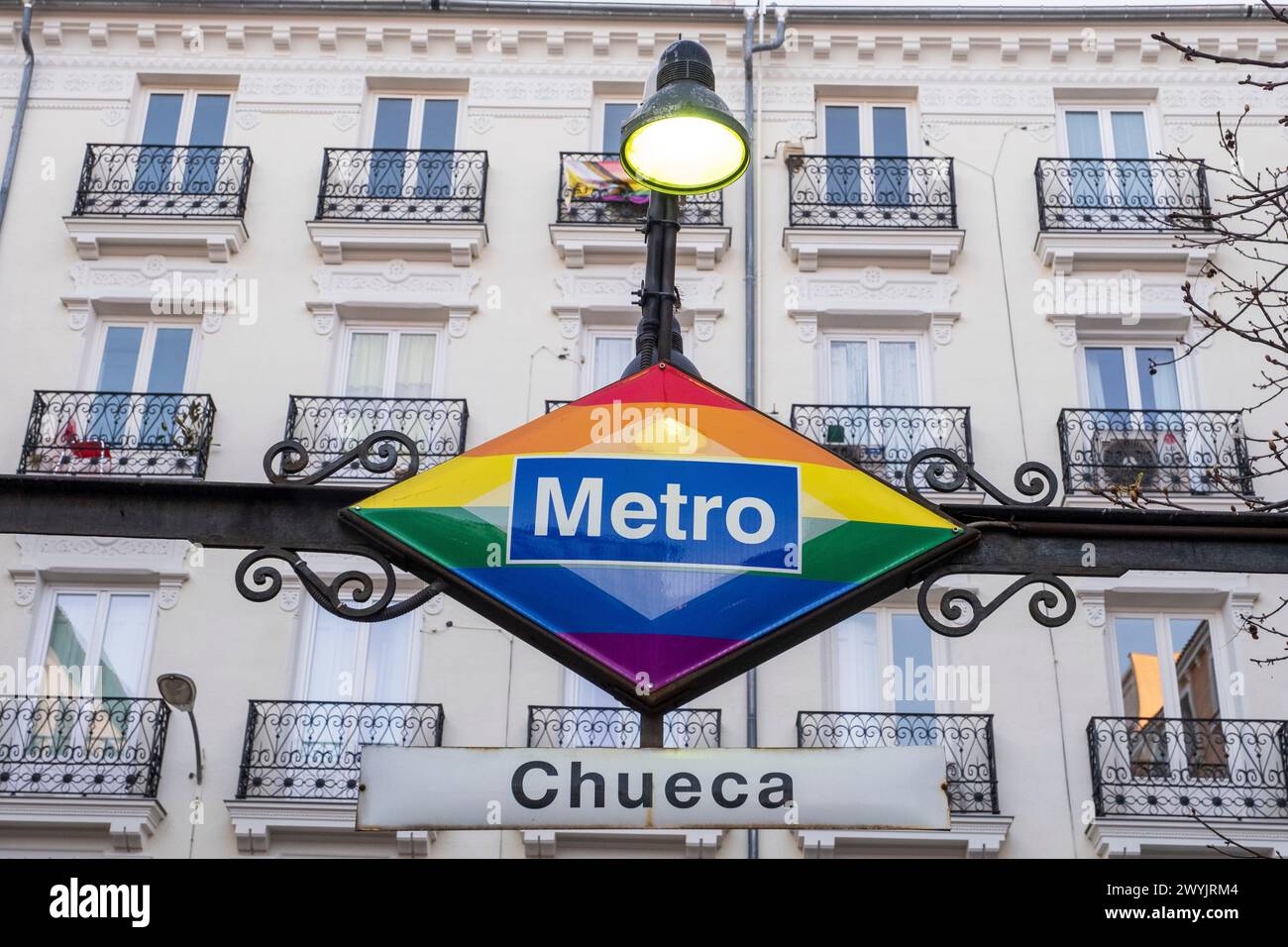 Spain, Madrid, Chueca metro sign with rainbow flag Stock Photo - Alamy