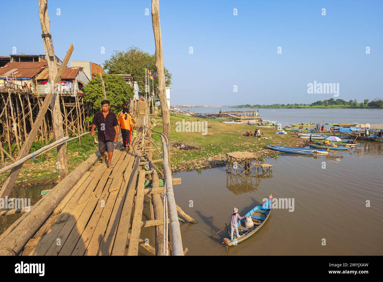 Cambodia, Kampong Chhnang, wooden footbridge on the banks of Tonle Sap ...