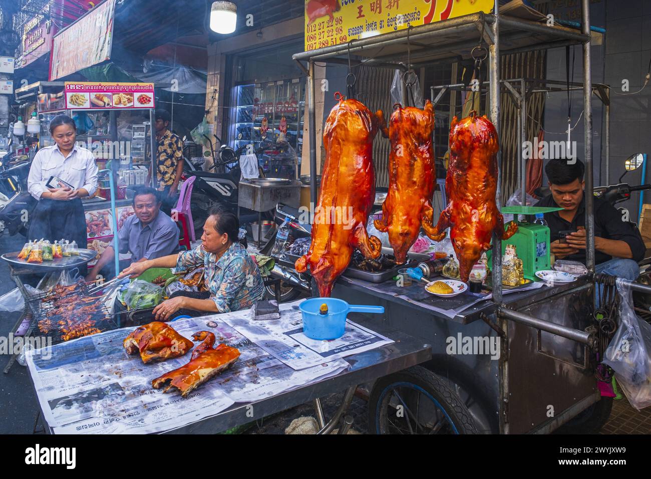 Cambodia, Phnom Penh, Prampi Makara district, Orussey Market, roasted ...