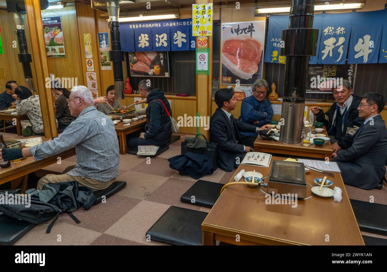 Customers at a traditional Kobe beef restaurant in Osaka,Japan Stock ...