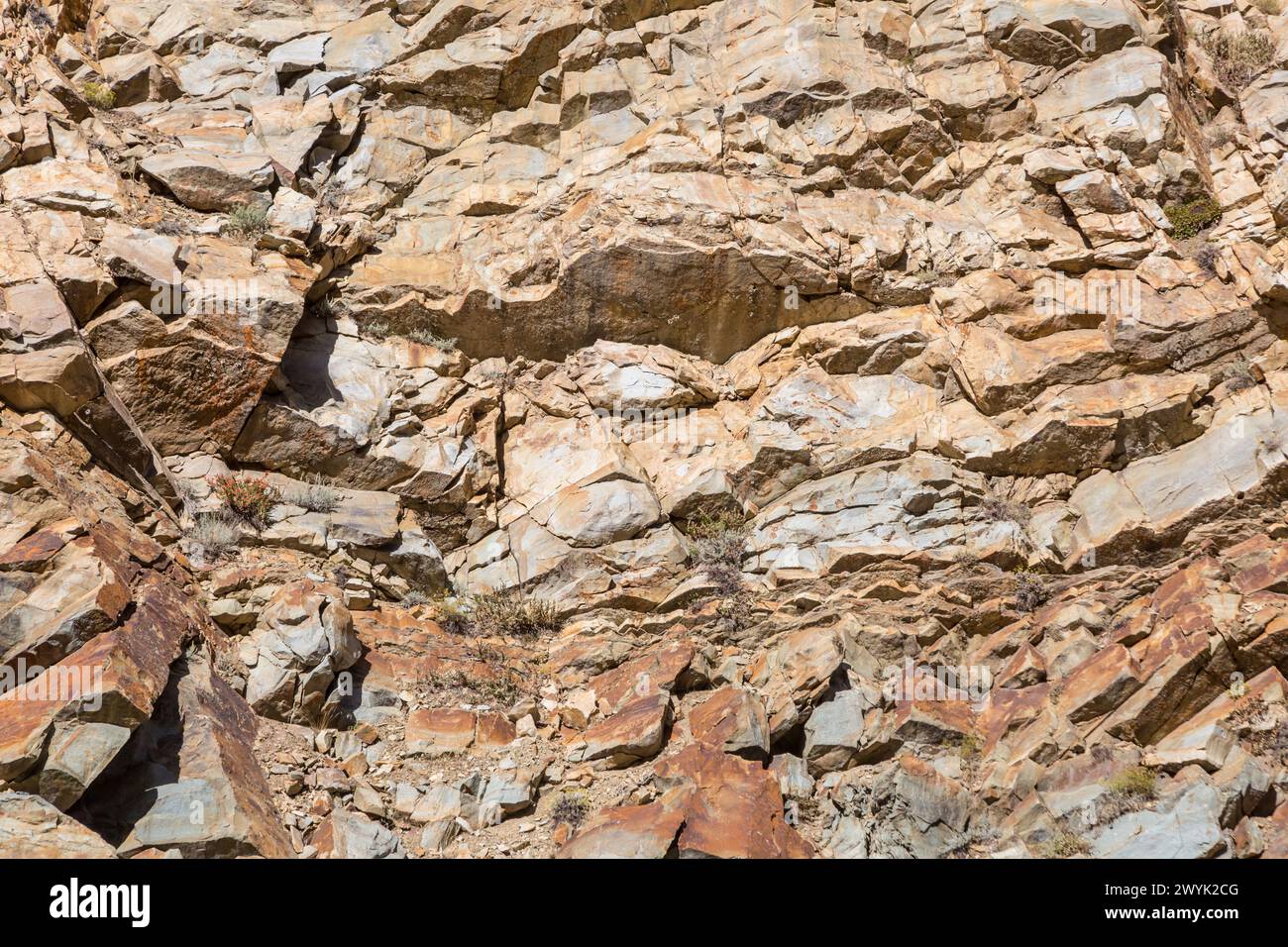 Natural rugged textured rock cliff background Stock Photo - Alamy