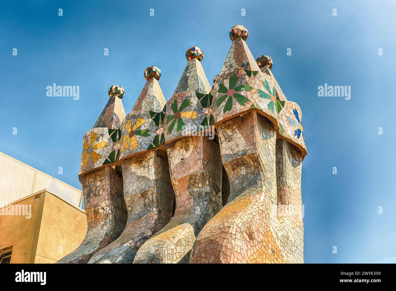 BARCELONA - AUGUST 9: Mosaic tile chimneys of Casa Batllo, renowned ...