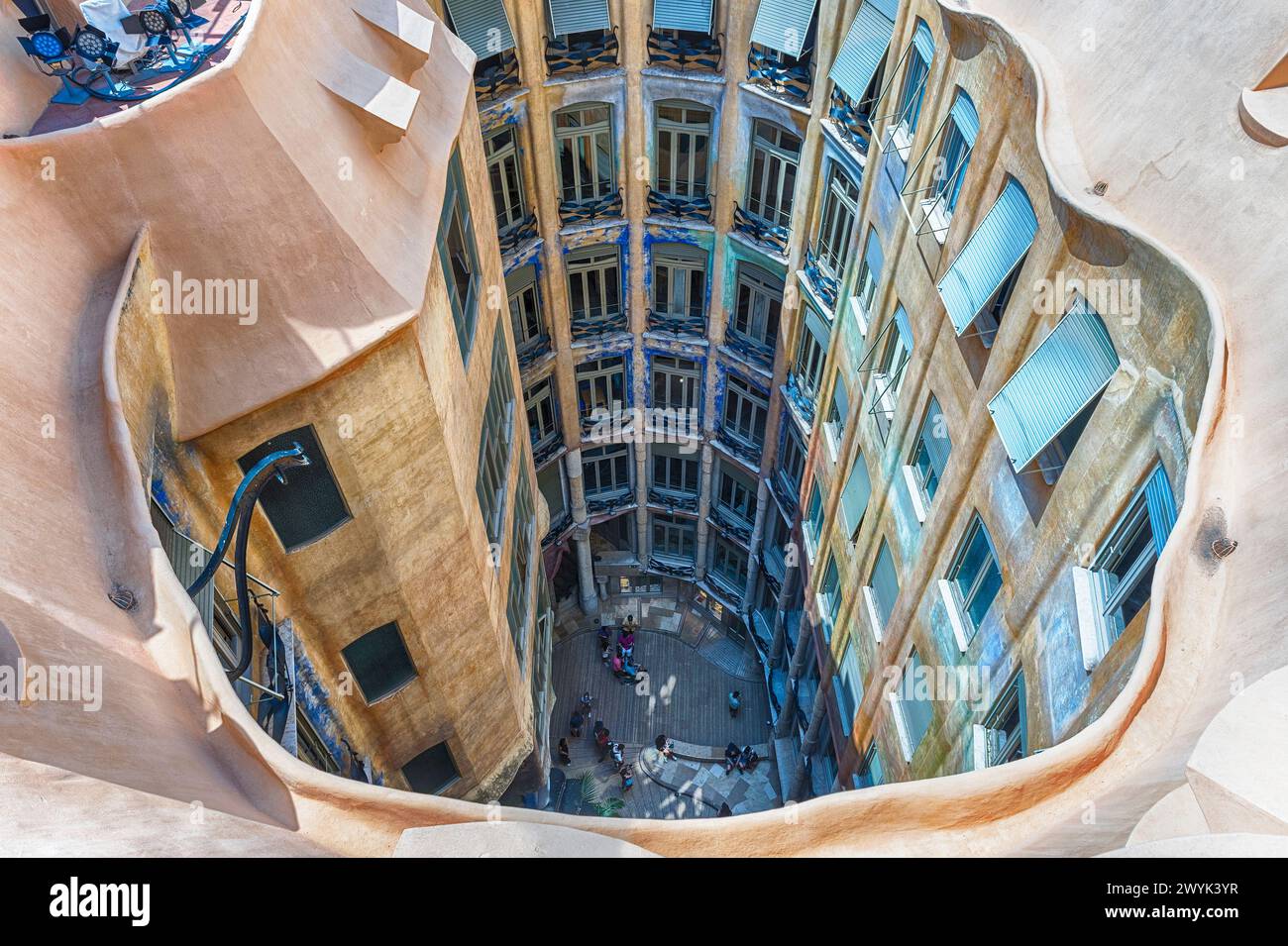 BARCELONA - AUGUST 9: Looking down at the inner courtyard of Casa Mila ...