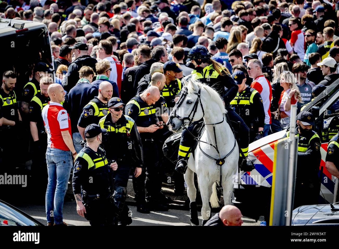 ROTTERDAM - Police officers keep an eye on De Kuip stadium prior to the ...