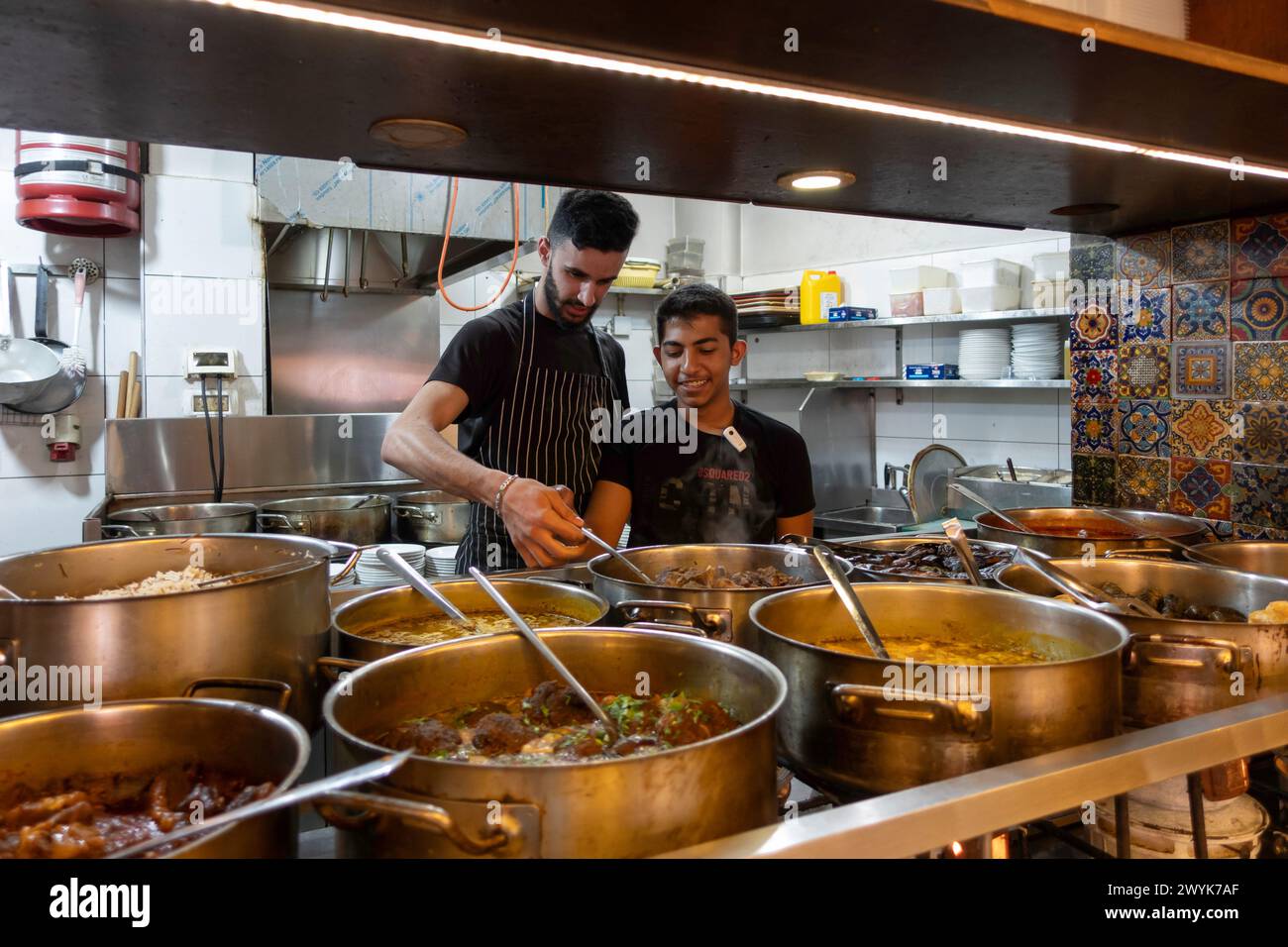 Kitchen staff work in Azura restaurant famous for its Turkish-inspired ...