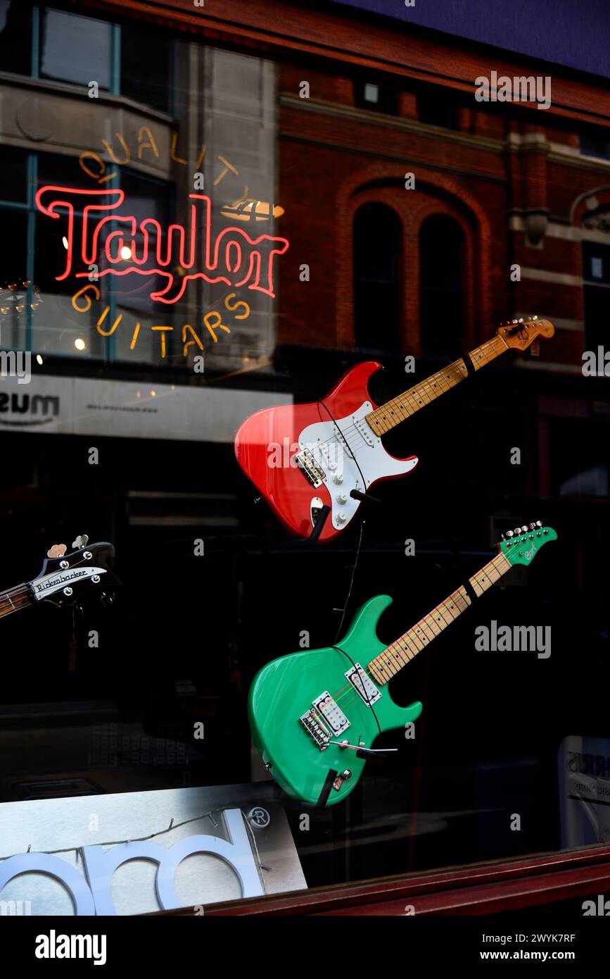 Guitar shop window Stock Photo - Alamy