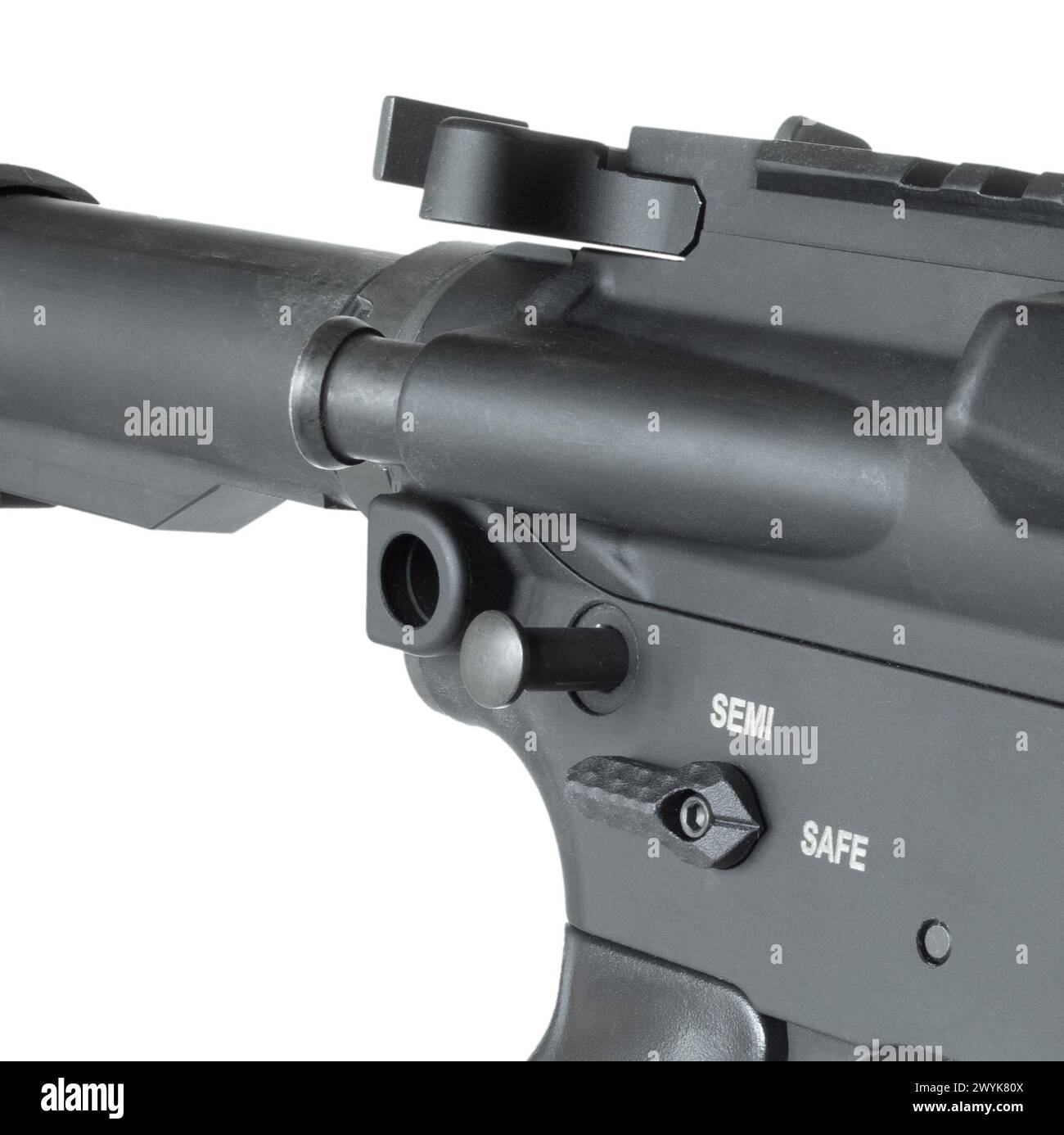 Takedown pin at the back of the lower receiver of an AR-15 partially ...