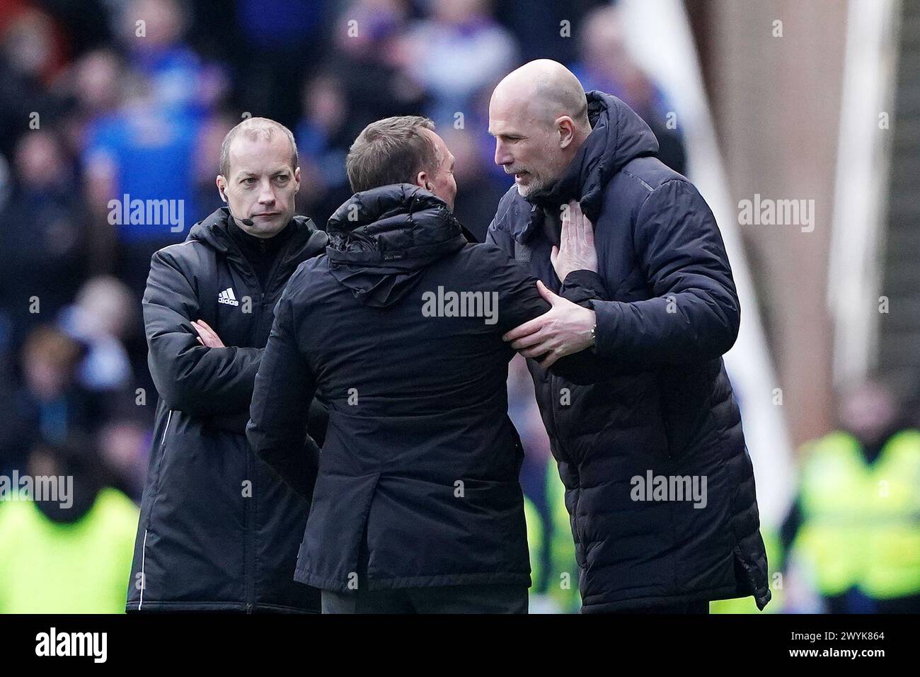Rangers manager Philippe Clement (right) embraces Celtic manager Brendan Rodgers following the ...