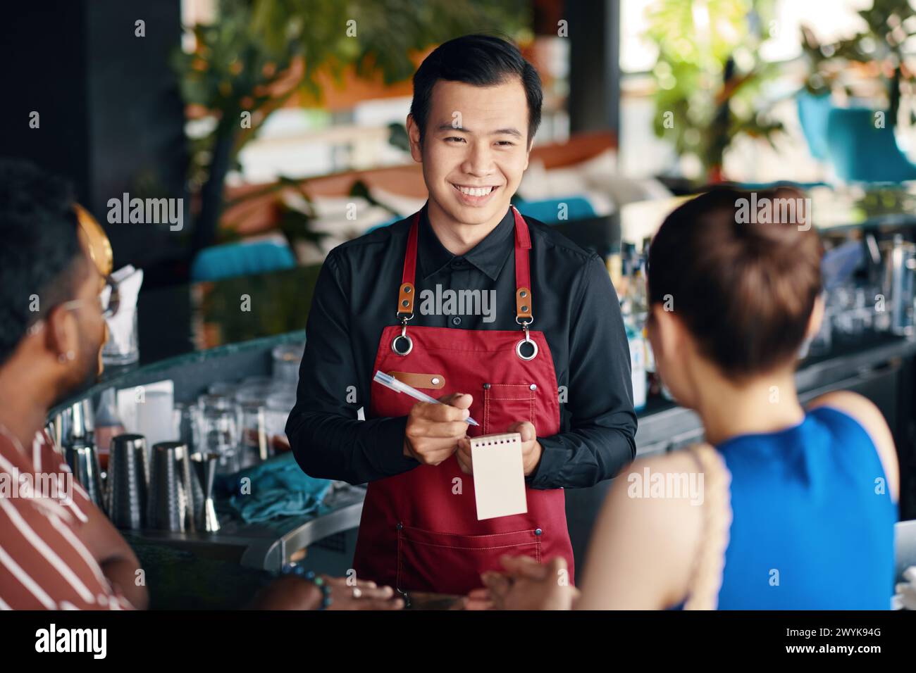 Recommending smiling hi-res stock photography and images - Alamy