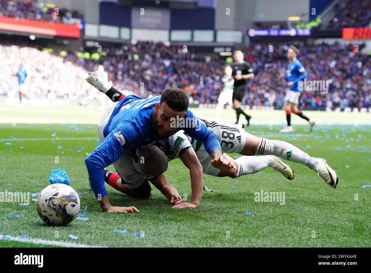 Rangers' Connor Goldson (left) and Celtic’s Daizen Maeda battle for the ...
