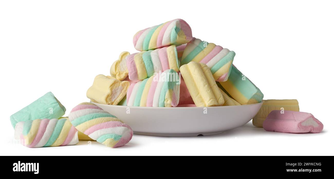 marshmallows in plate and scattered, colorful fluffy soft sugar ...