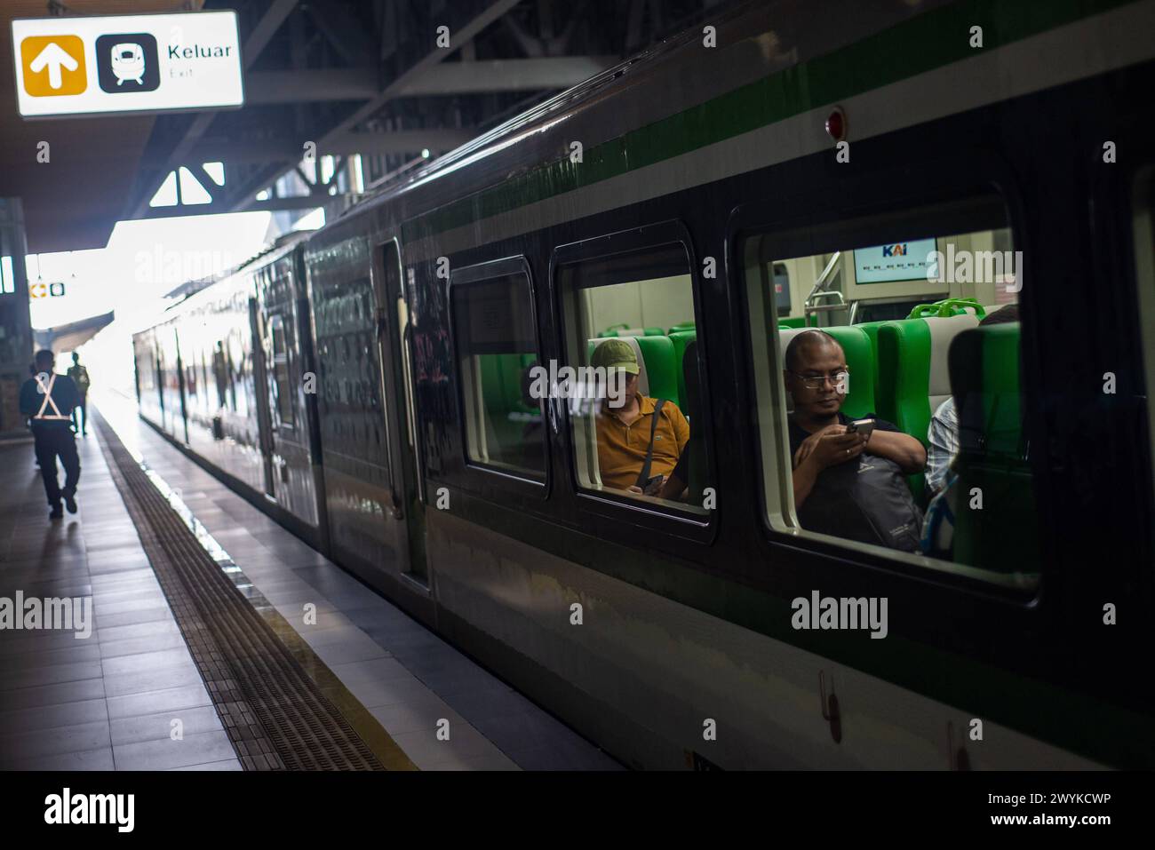 ALTERNATIVE TRANSPORTATION FOR HOMECOMING SEASON Passengers sit on a ...