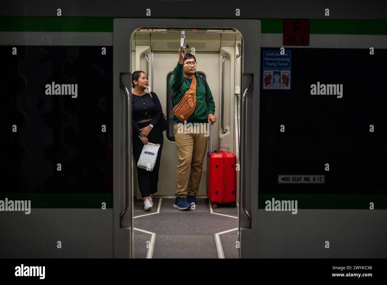 ALTERNATIVE TRANSPORTATION FOR HOMECOMING SEASON Passengers on a feeder ...