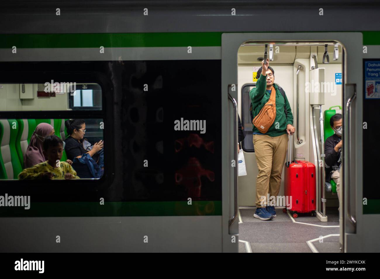 ALTERNATIVE TRANSPORTATION FOR HOMECOMING SEASON Passengers on a feeder ...