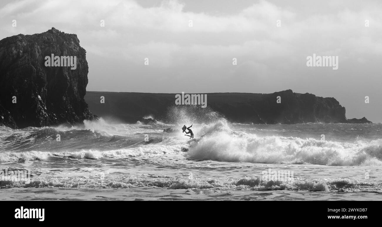 Wave board surfing in huge breakers, Kynance Cove, Cornwall. Wipe out ...