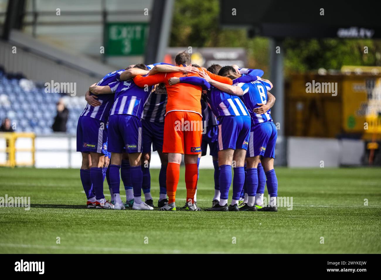 Worcester City players huddle before the Isuzu FA Vase semi-final 1st leg against Wakering ...