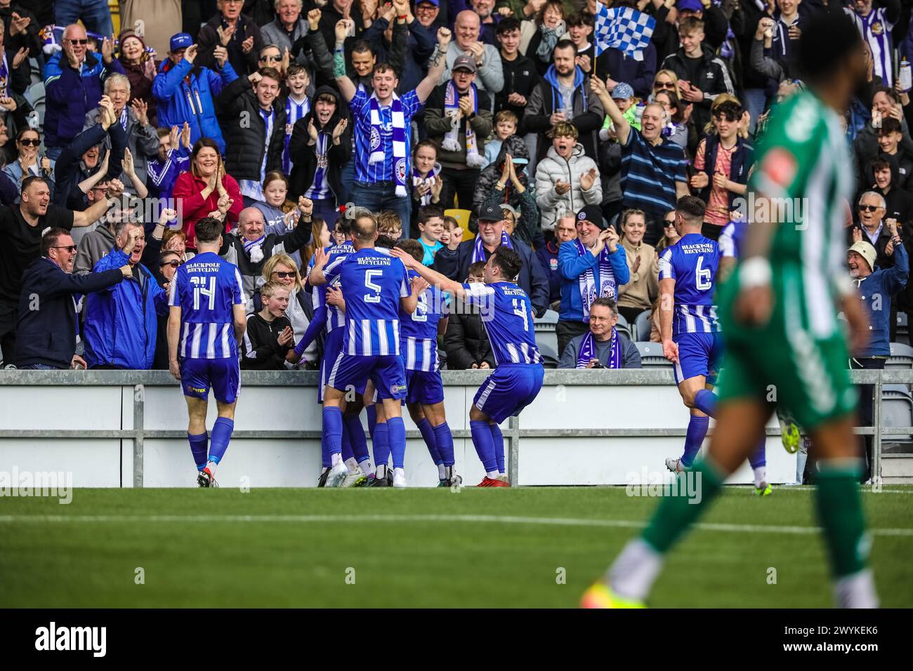 Worcester City players run to their supporters to celebrate Elliott ...