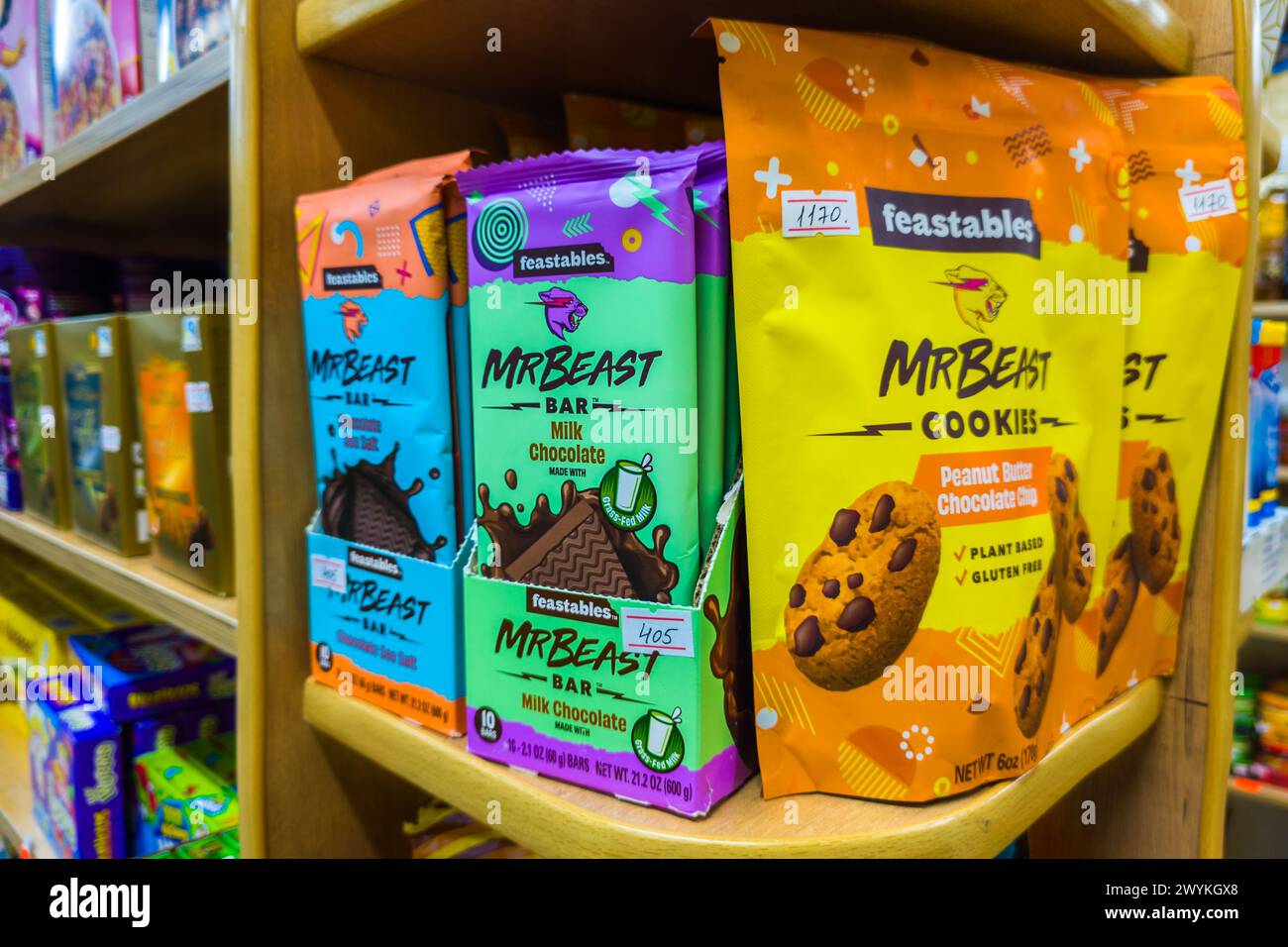 Chocolate bars and cookies by Mr Beast on small store shelf, his ...