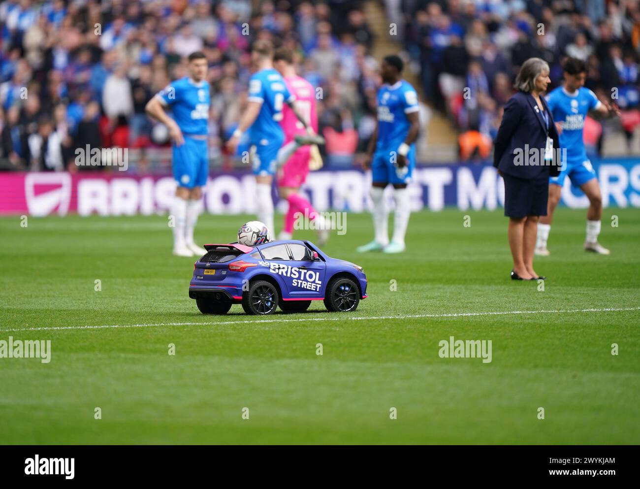 The match ball is presented by remote controlled car ahead of kick off ...