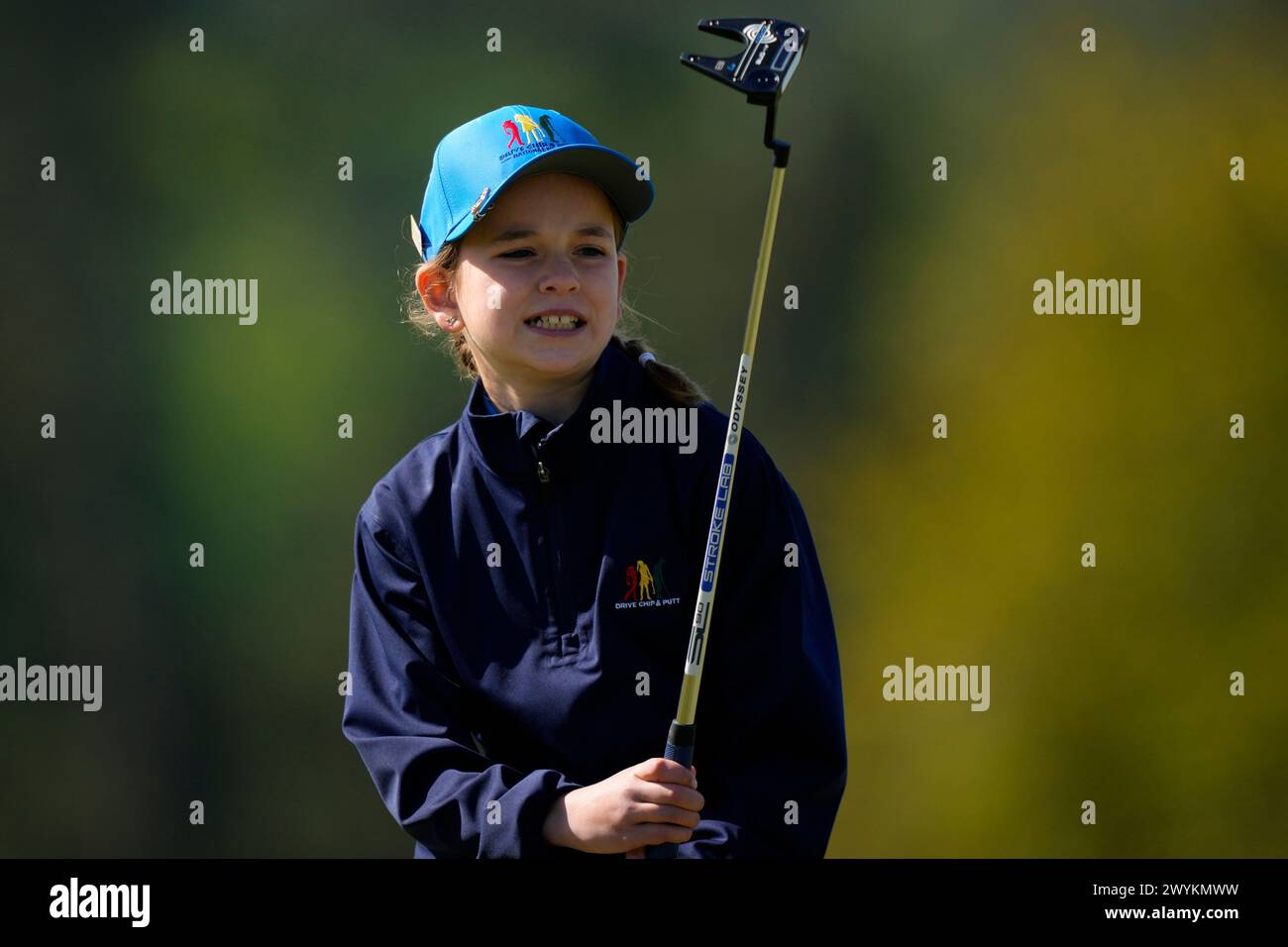 Anna Midyett, of Bennington, Neb., reacts after a putt during the Drive ...
