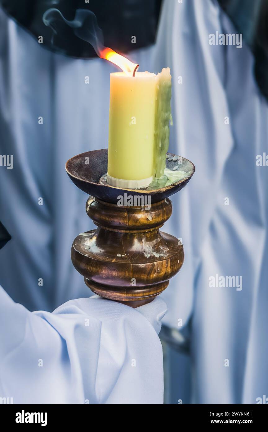 Illuminating Devotion: A Candle’s Glow Amidst Valladolid’s Holy Week ...