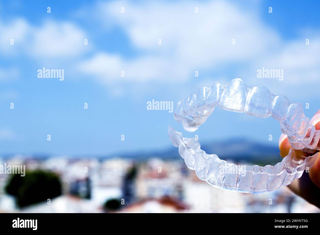 Invisible teeth aligner on light background. No people Stock Photo - Alamy