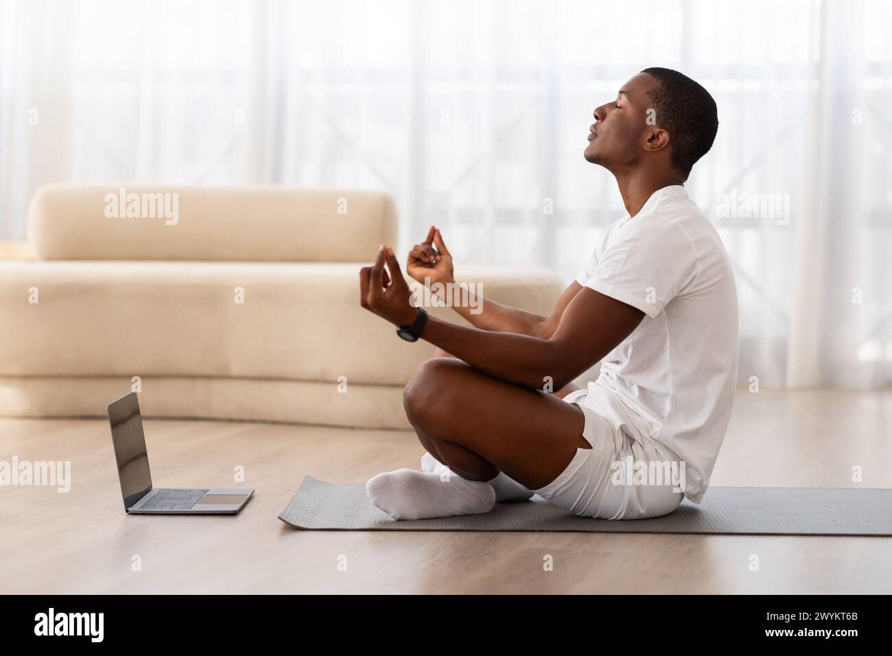 African american man meditating hi-res stock photography and images - Alamy