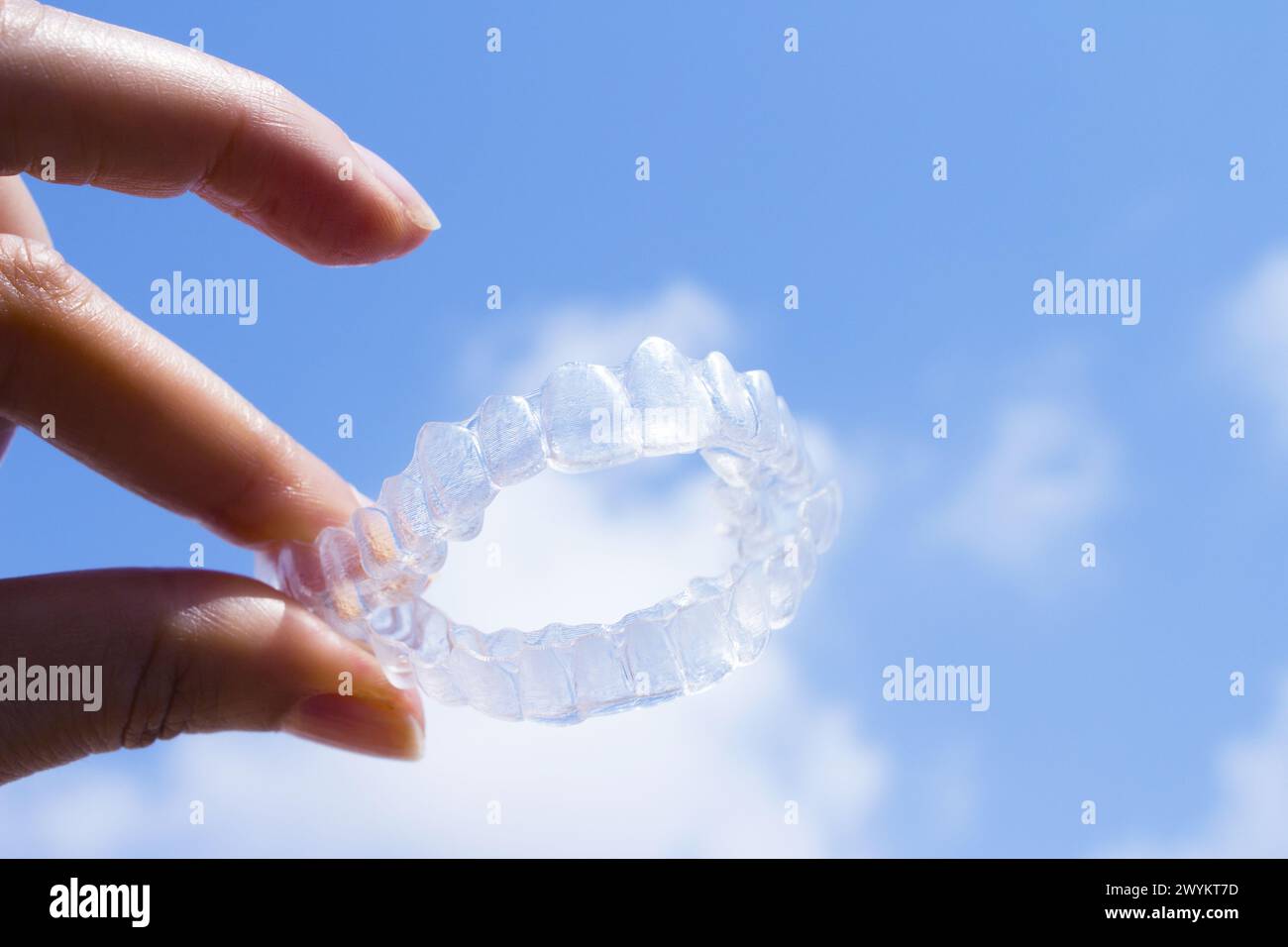 Invisible teeth aligner on light background. No people Stock Photo - Alamy