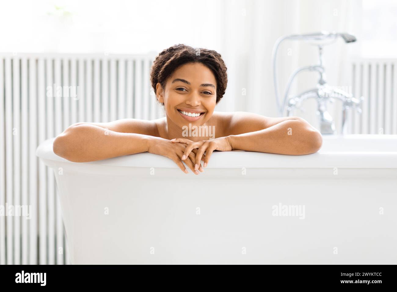 Peeking bathtub hi-res stock photography and images - Alamy