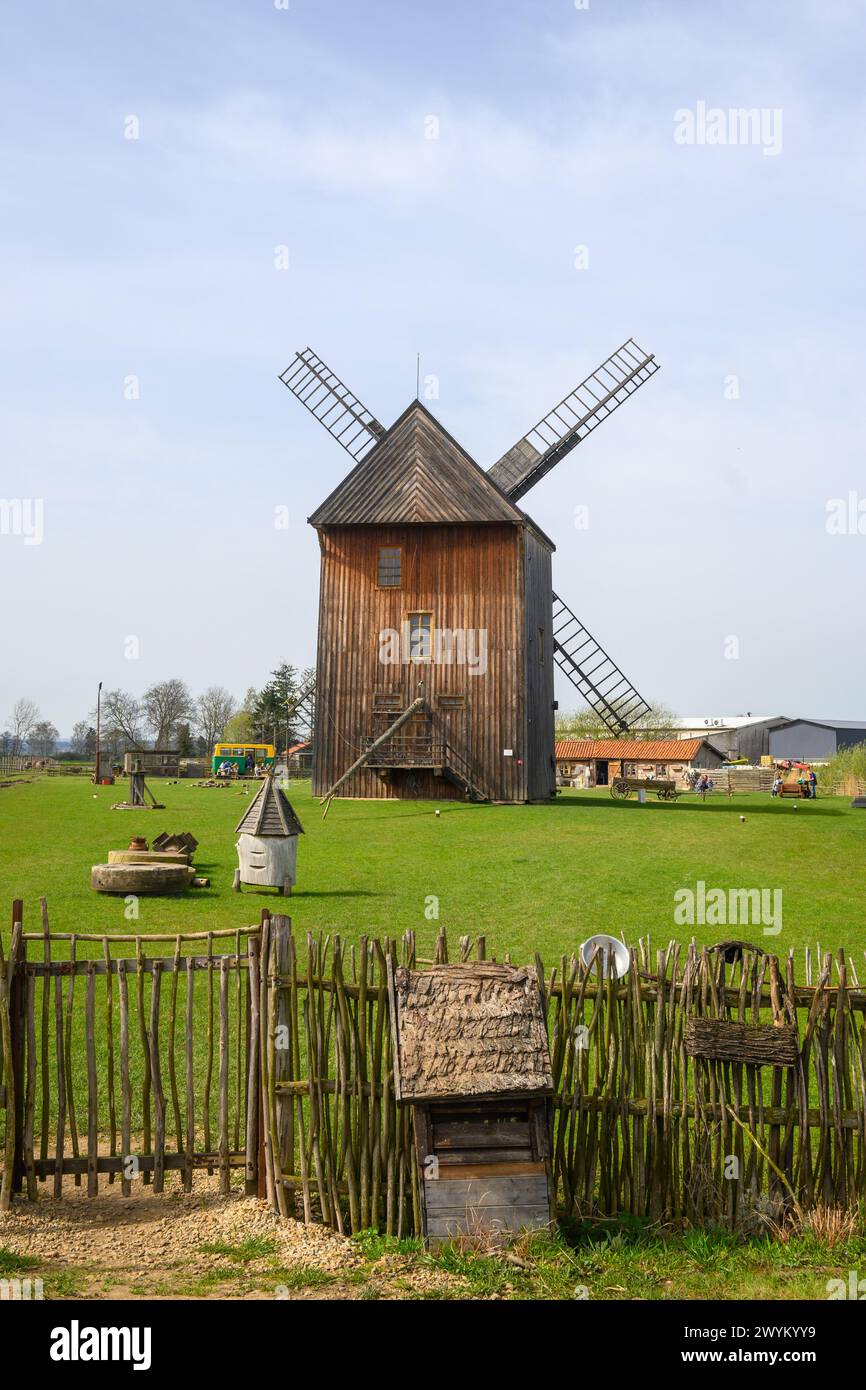 Mokry Dwor, Poland - April 7, 2024: Traditional wooden paltrak windmill in Mokry Dwor village ...