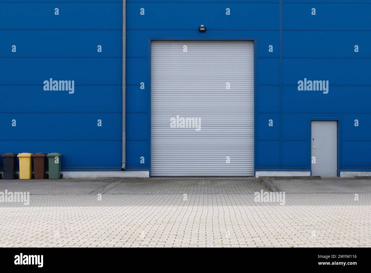 Bright Blue Warehouse Shutter Entrance Stock Photo - Alamy