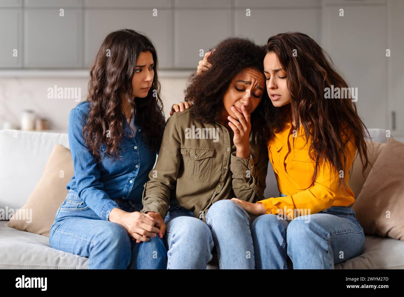 Friends helping crying hi-res stock photography and images - Alamy