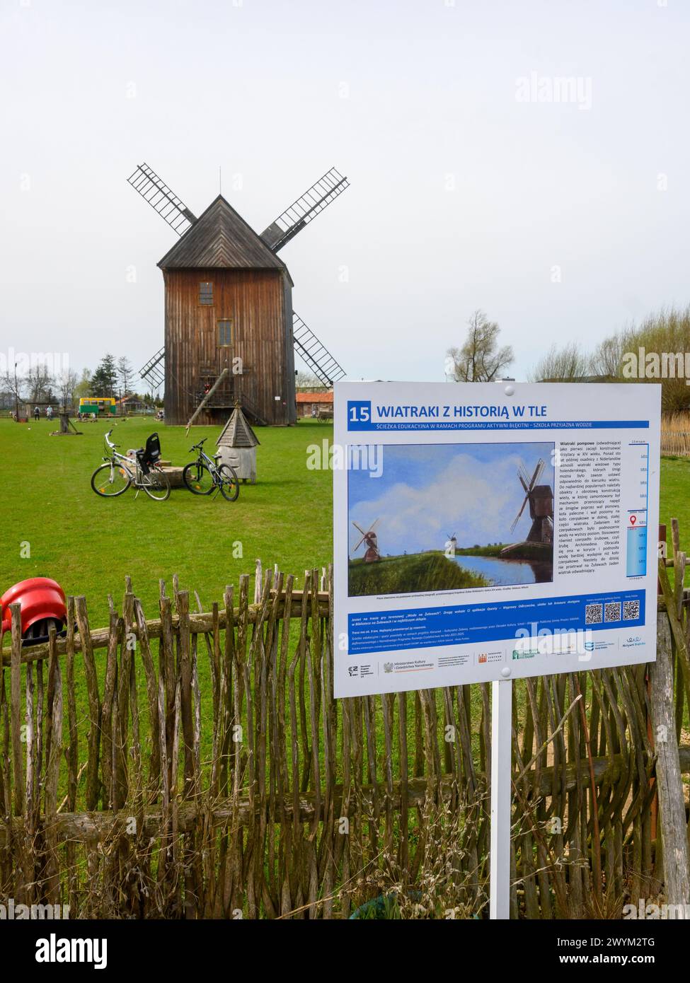 Mokry Dwor, Poland - April 7, 2024: Traditional wooden paltrak windmill in Mokry Dwor village ...