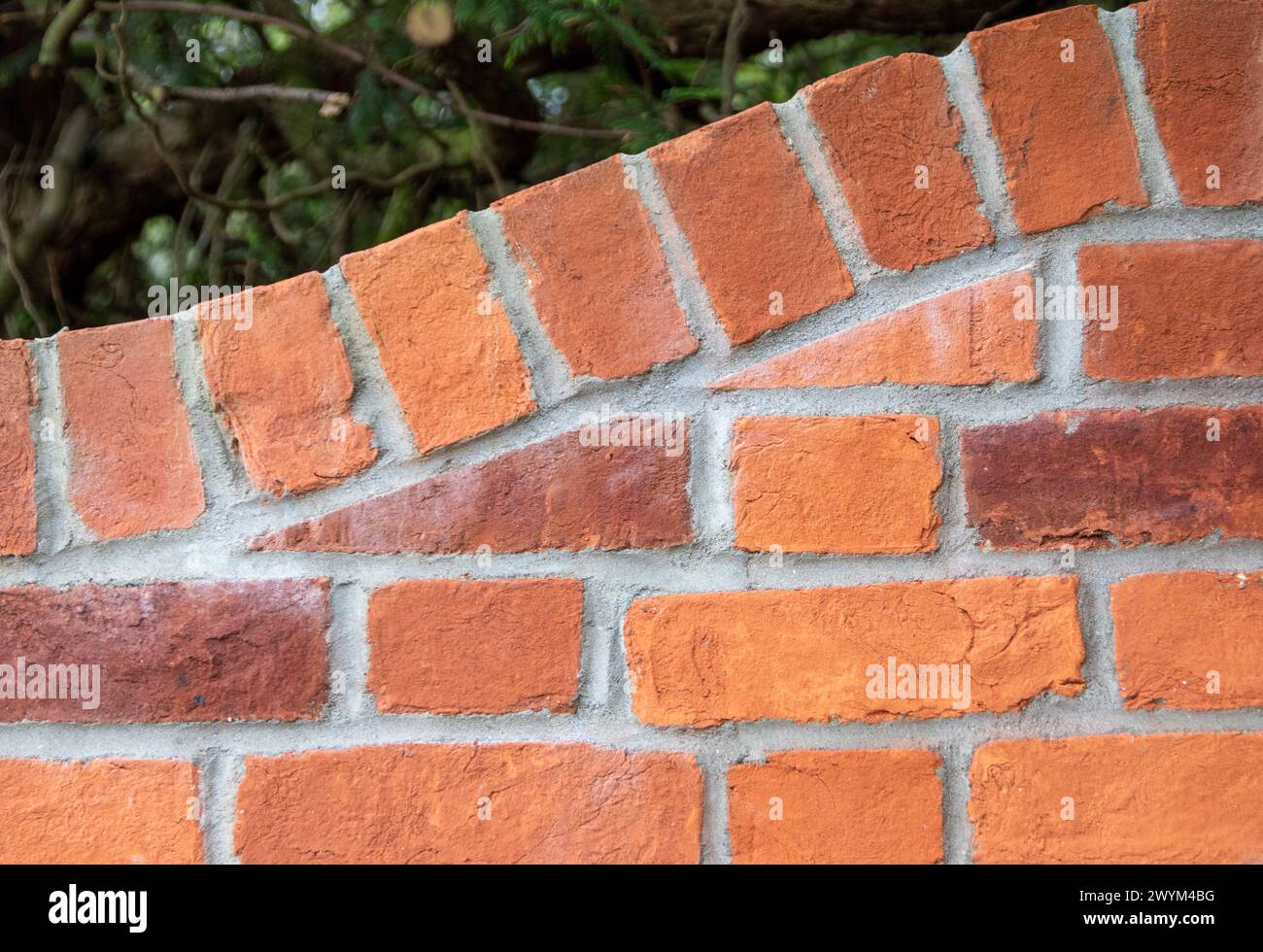 Neatly executed new brick wall using a Suffolk/Flemish bond and some ...