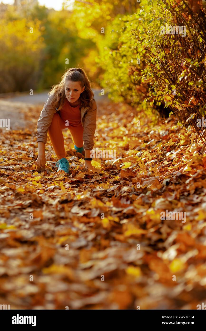 Hello autumn fit woman hi-res stock photography and images - Alamy