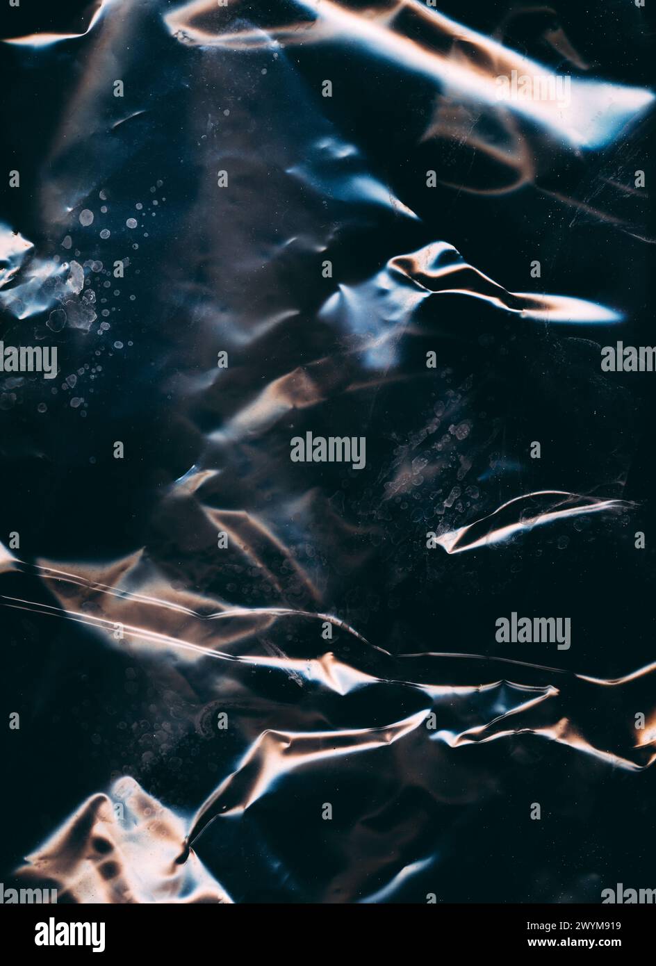 Wrinkled texture. Old foil. Black crumpled creased plastic overlay ...