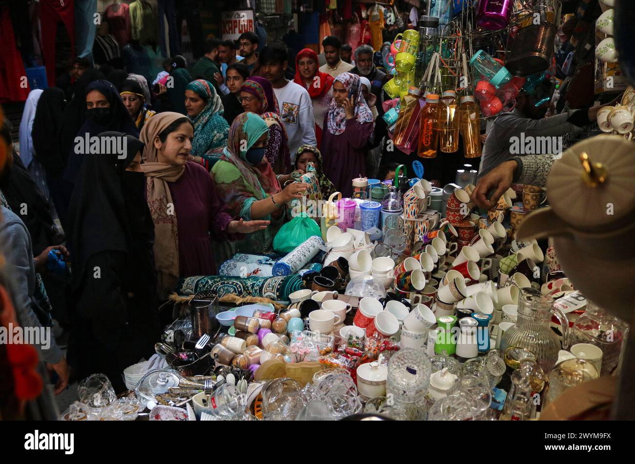 April 07, 2024, Srinagar, India: Women shop at a crockery store ahead of Eid Al-Fitr which marks ...