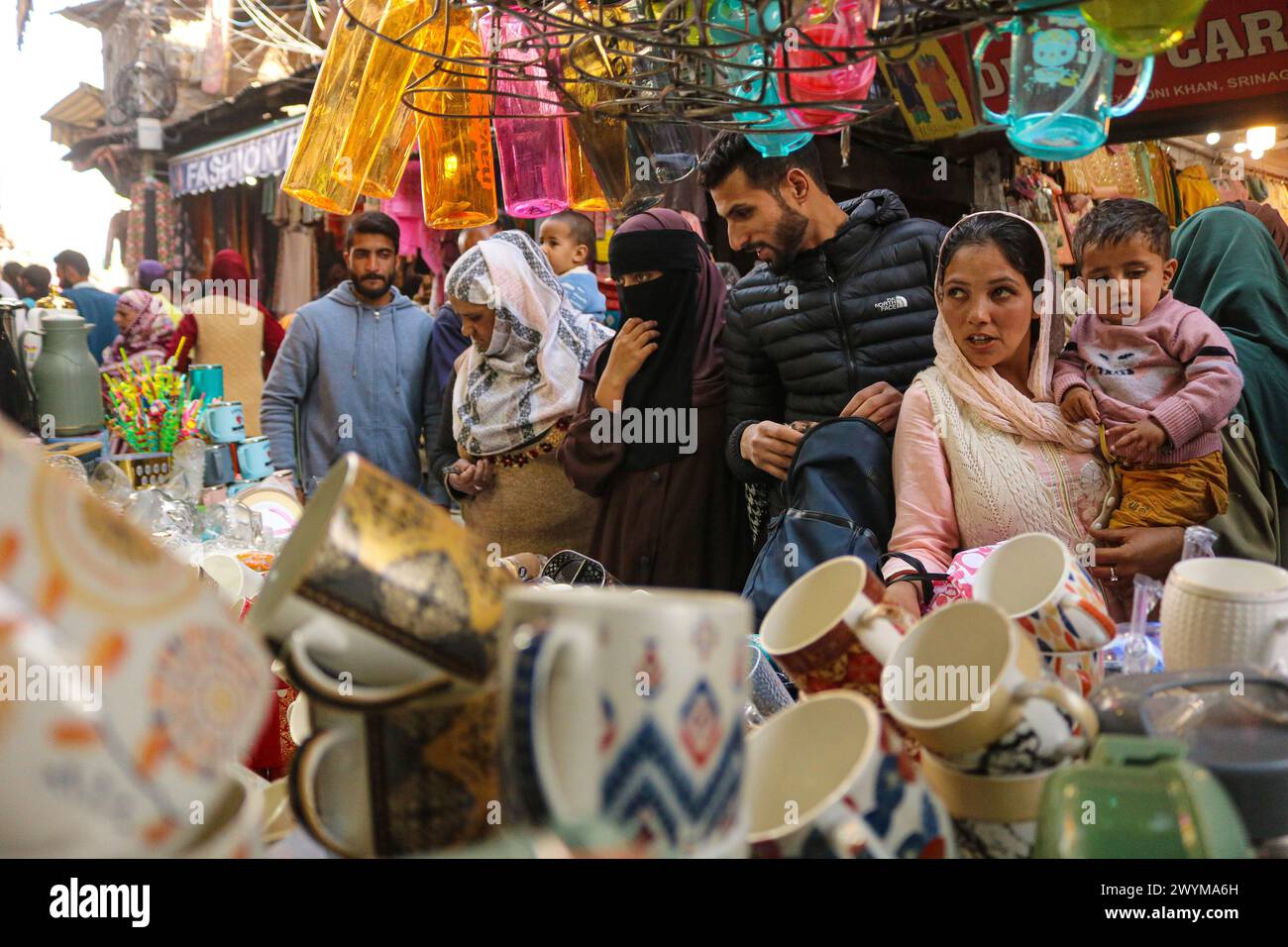 April 07, 2024, Srinagar, India: Women shop at a crockery store ahead of Eid Al-Fitr which marks ...