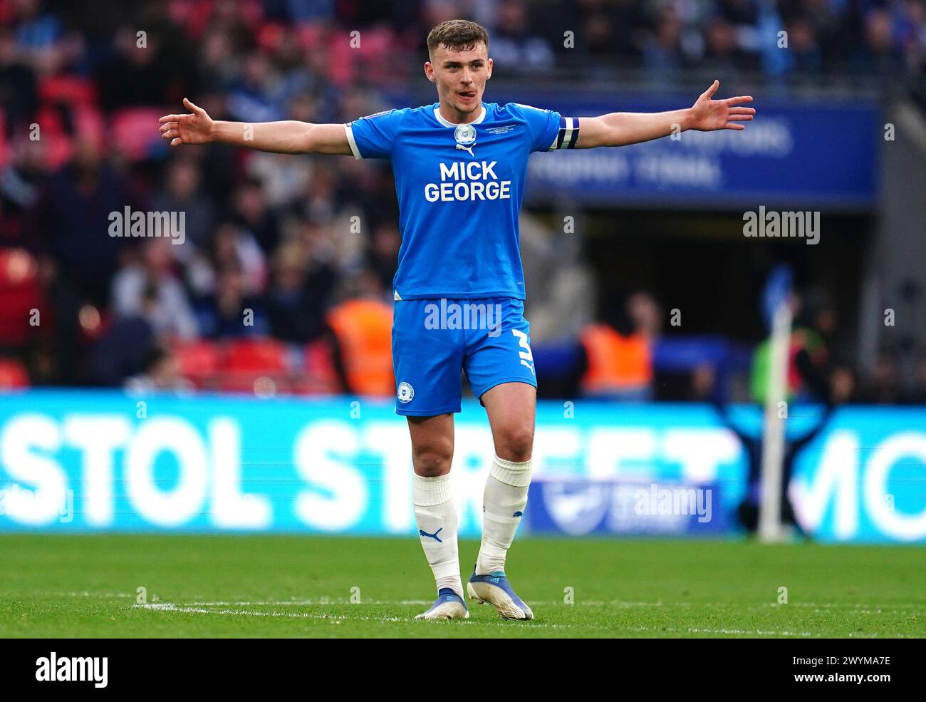 Peterborough United's Harrison Burrows celebrates victory in the ...