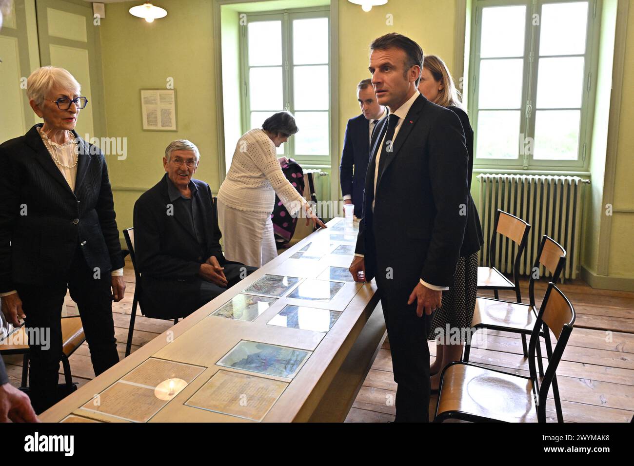 Izieu, France. 07th Apr, 2024. French President Emmanuel Macron flanked ...