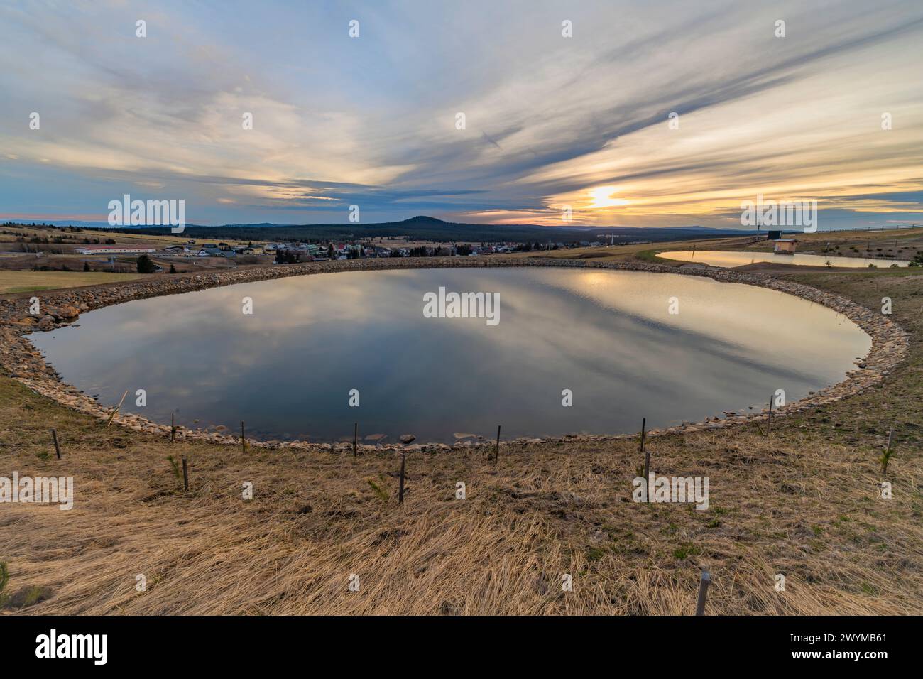 Water reservoir in sunset color evening near Bozi Dar town in spring ...