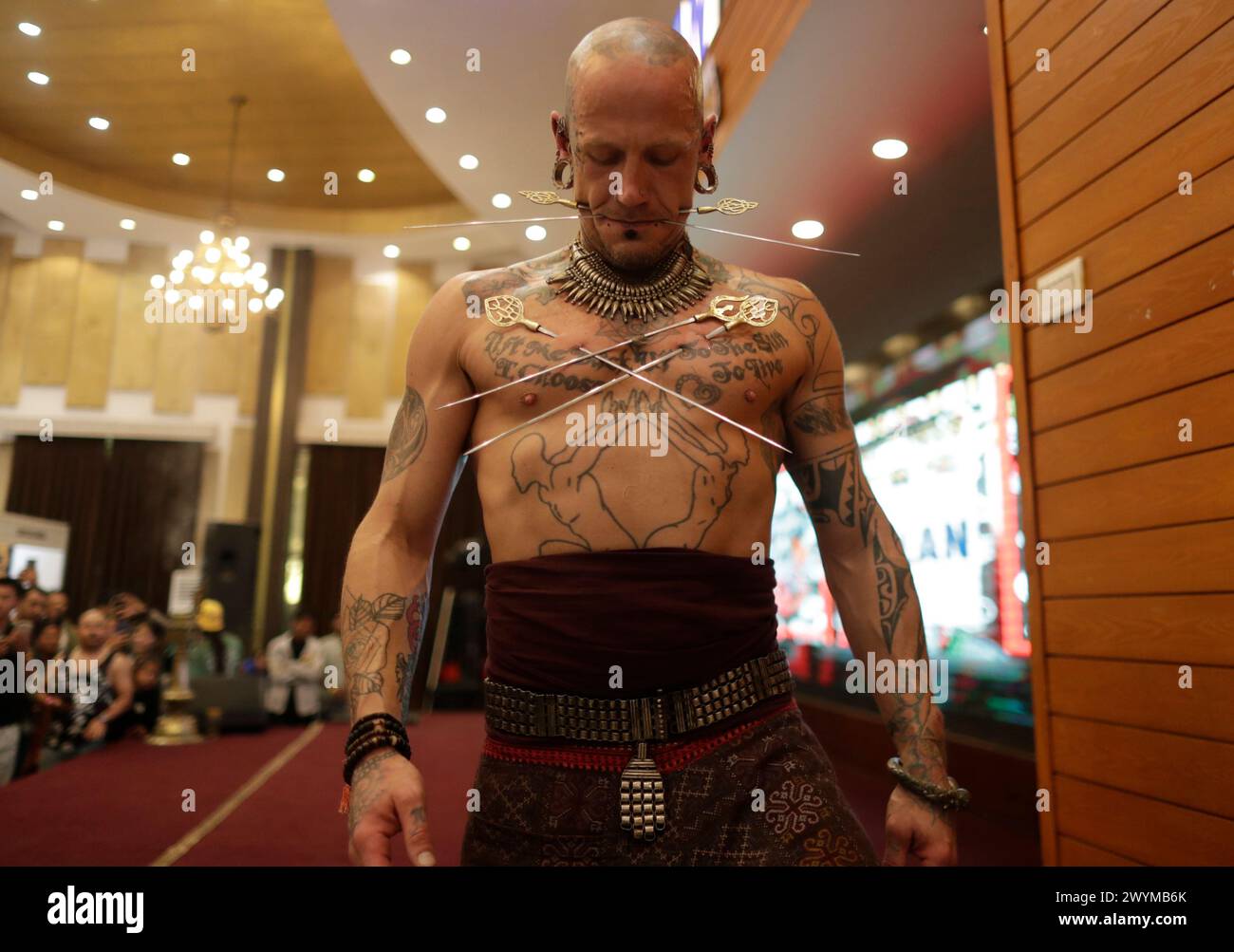 Lalitpur, Nepal. 07th Apr, 2024. A man with multiple needle piercings ...