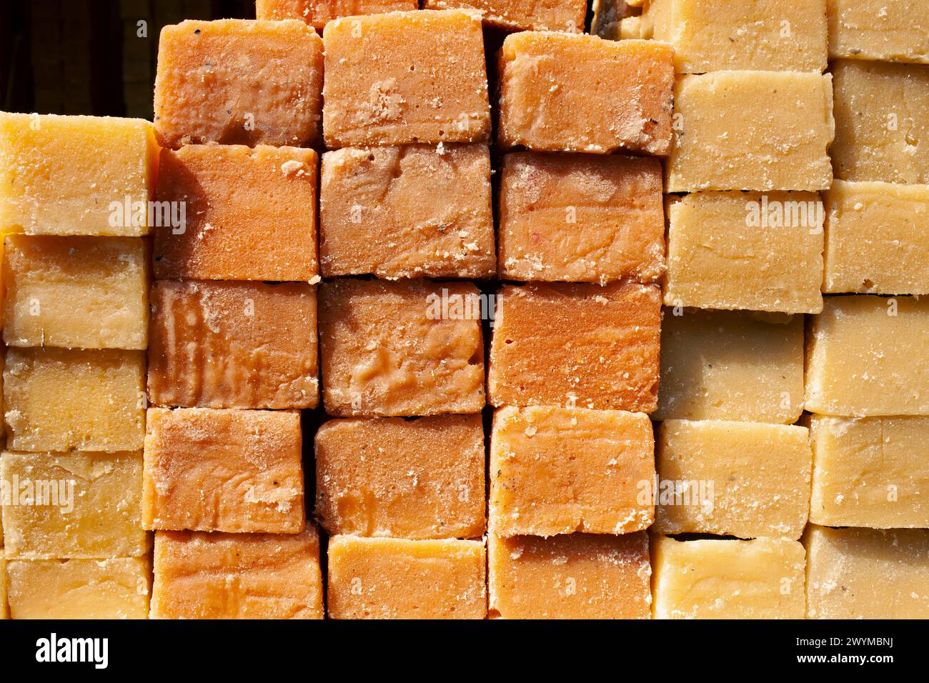 Loose sugar squares on a Mysore market stall. Street photography in ...