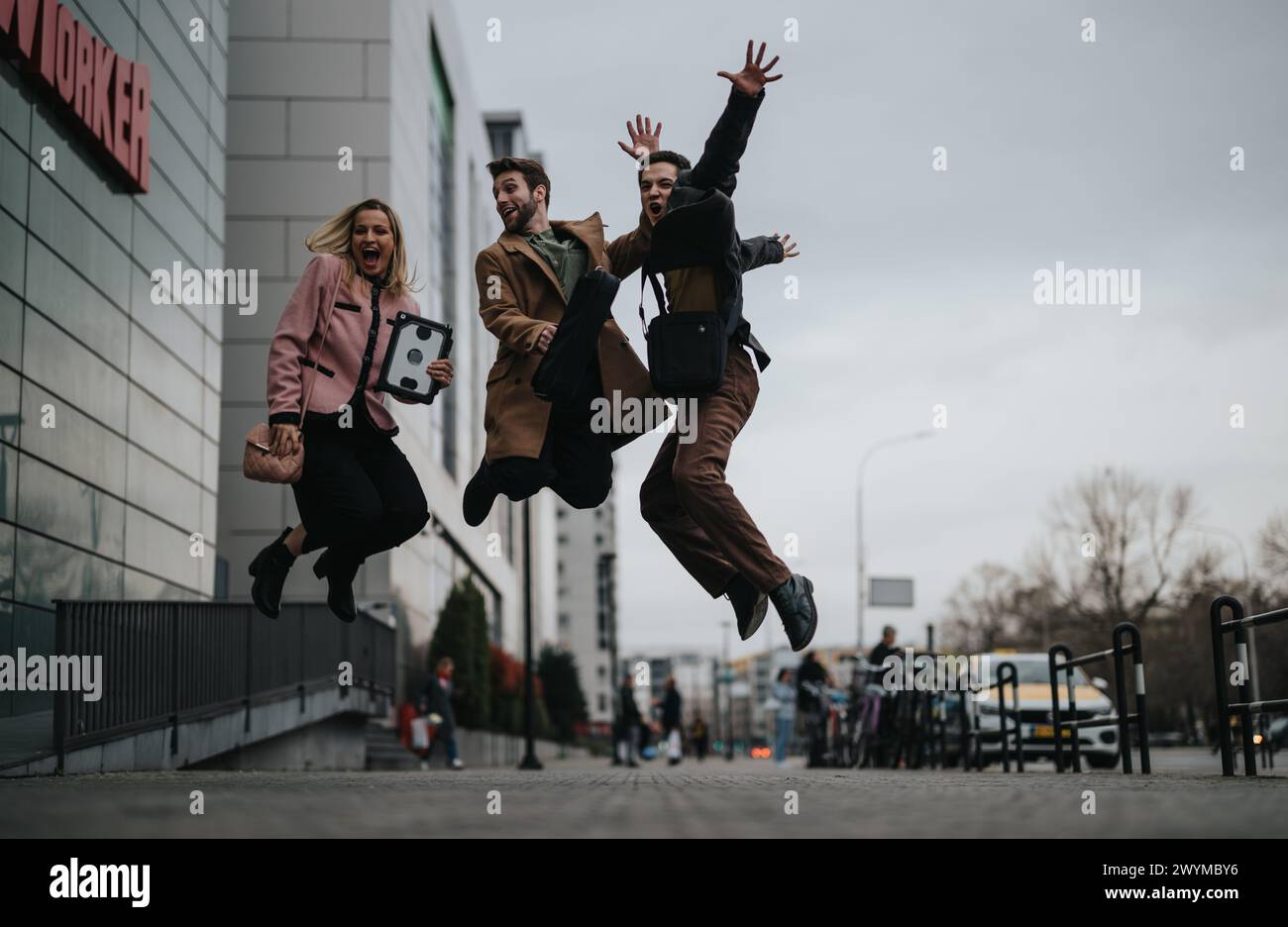 Team excited businesspeople jumping hi-res stock photography and images ...