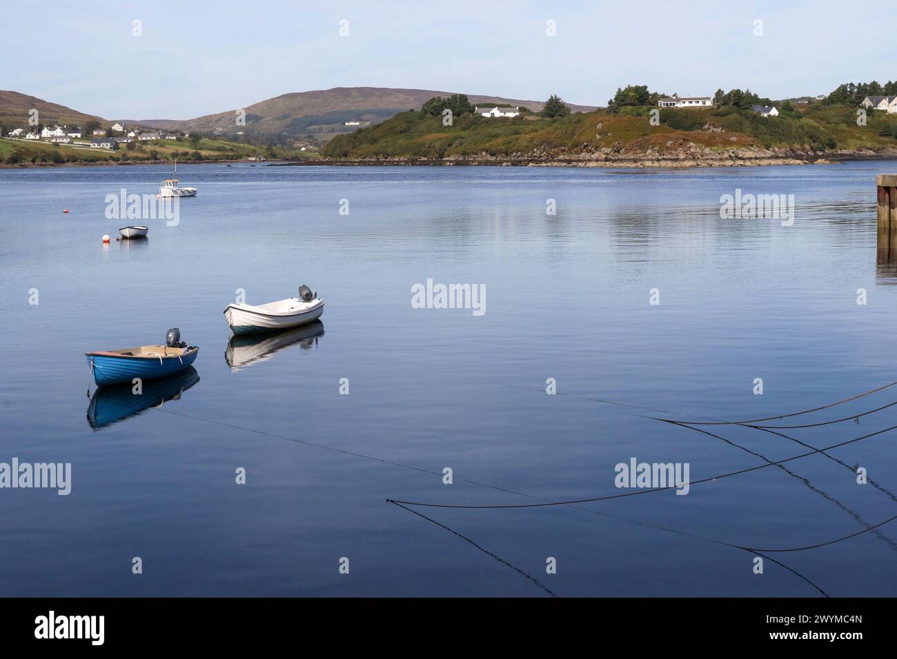 Small inshore fishing boats moored in Gaeltacht, Teelin Harbour County ...