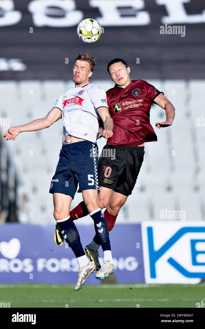 AGF's Frederik Tingager and FC Midtjylland's Gue-Sung Cho in the 3F ...