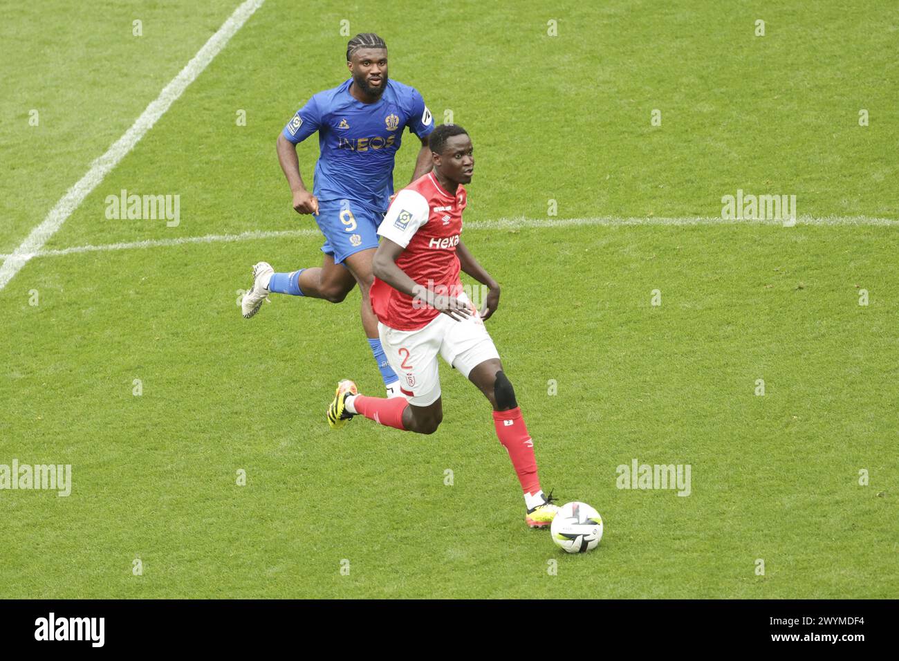 Joseph Okumu of Reims, left Terem Moffi of Nice during the French ...