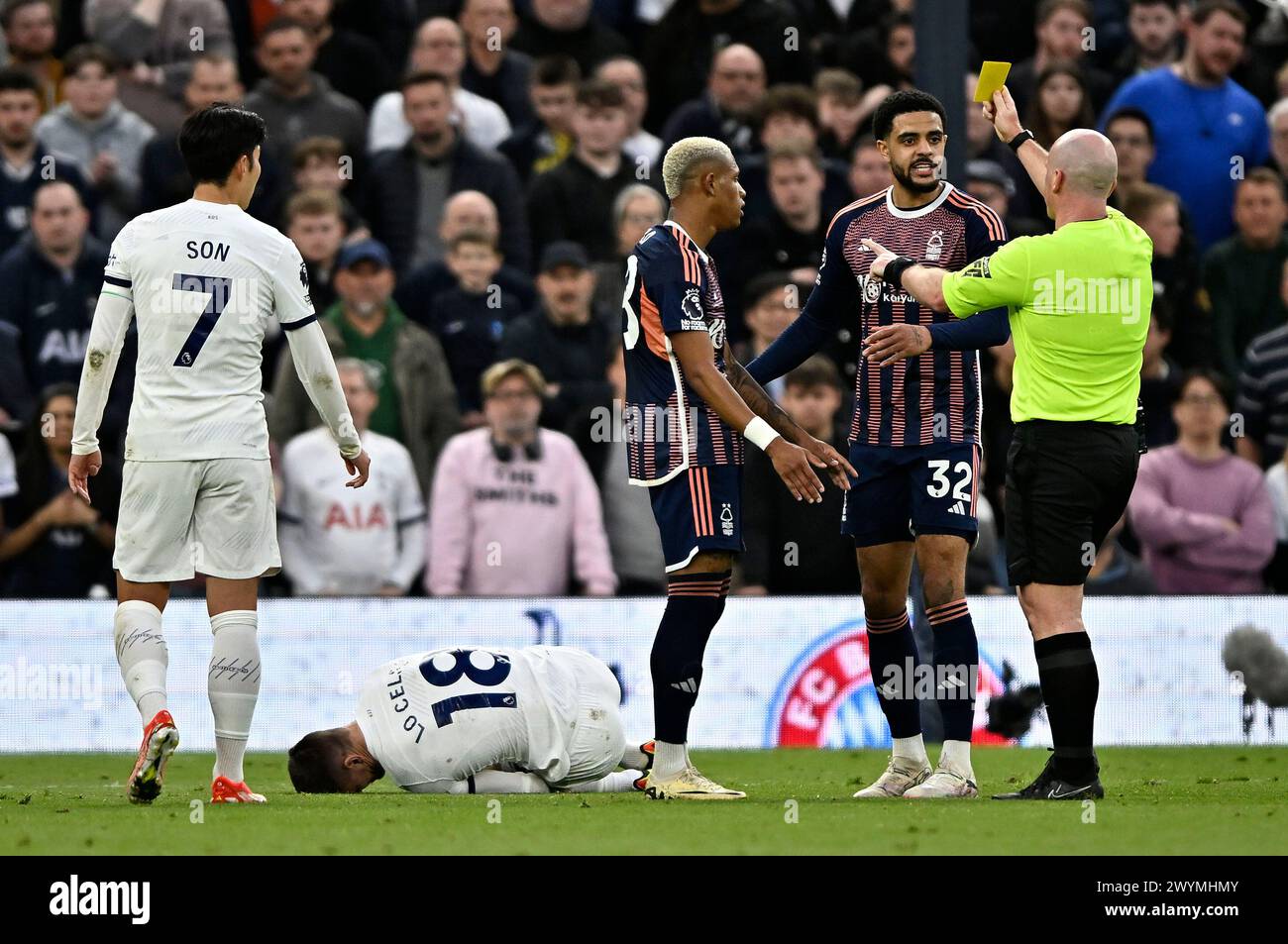 London, UK. 7th Apr, 2024. Simon Hooper (Referee) shows the yellow card ...