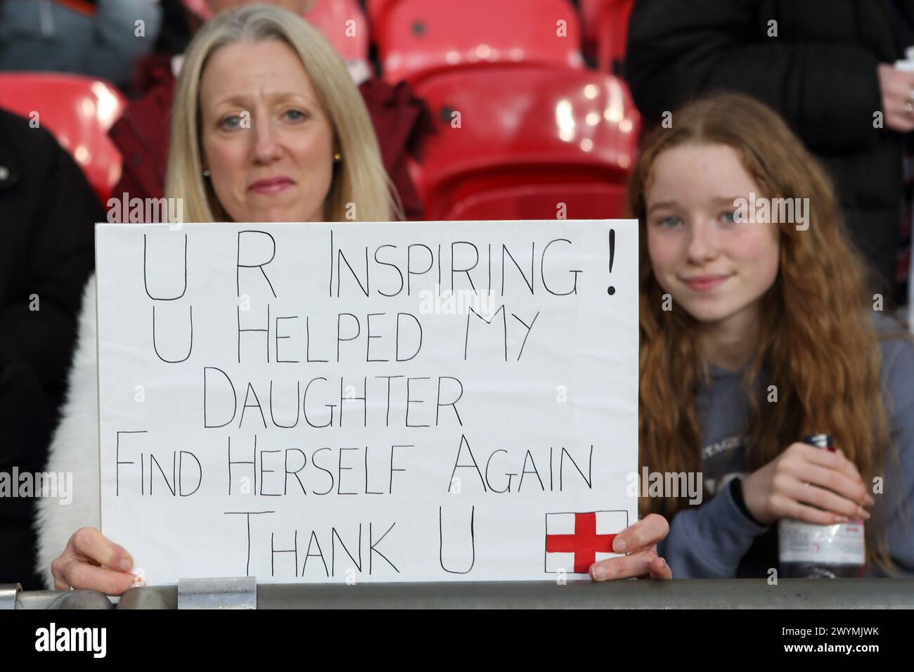 Mother and daughter with placard U R Inspiring England v Sweden UEFA ...