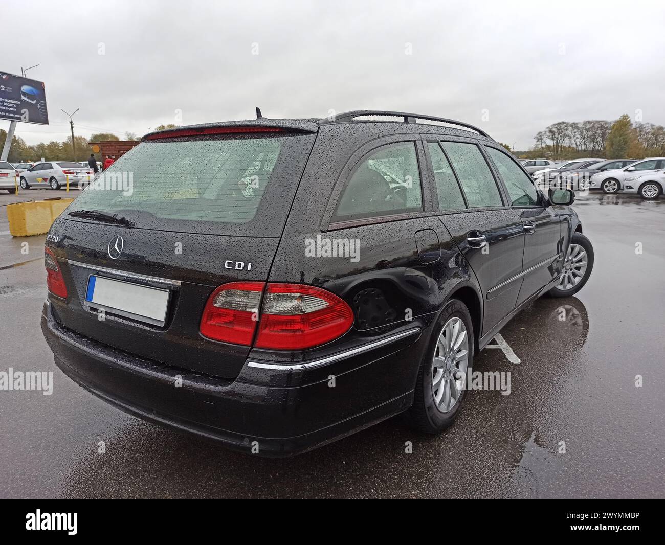 Back view of a car Mercedes-Benz E-Class station wagon Stock Photo - Alamy